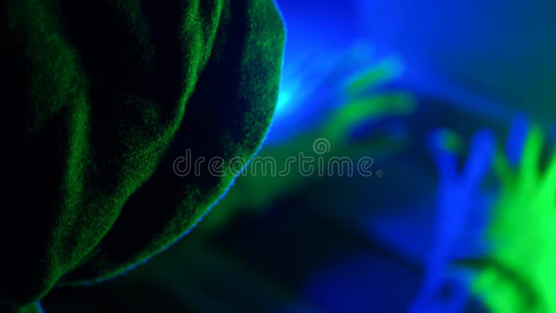 Hacker Hands Working on Laptop Under Blue and Green Light at Night ...