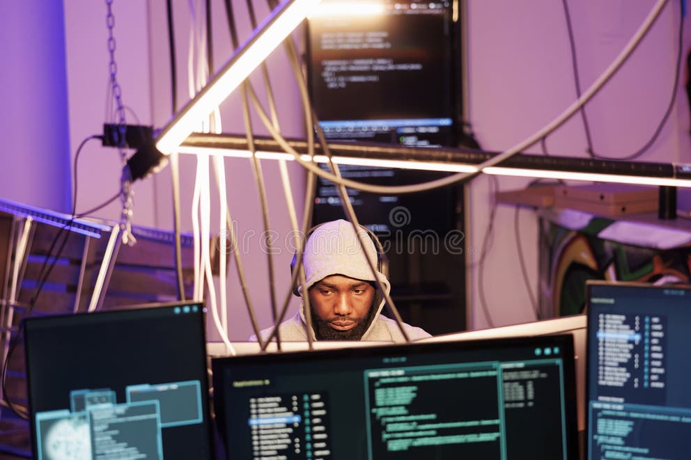 Hacker in Headphones Programming Malware Stock Photo - Image of system ...