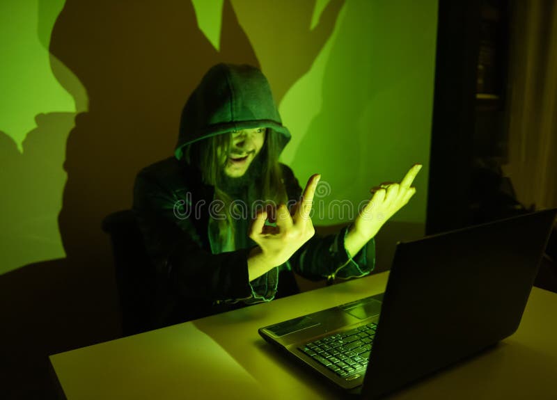 Hacker on His Computer Showing the Finger To Authority Stock Image ...