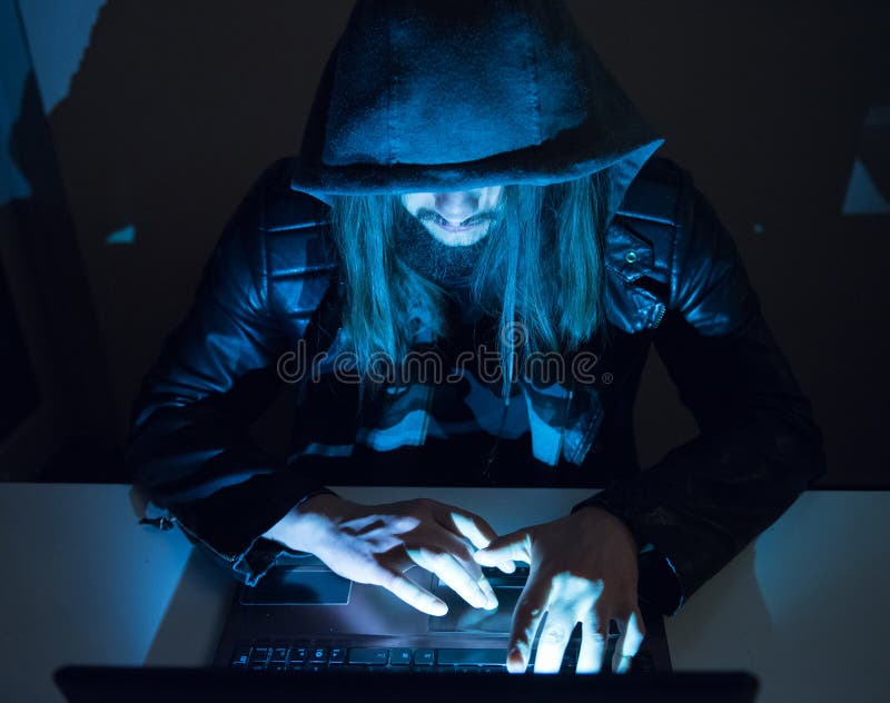 Hacker on His Computer Trying To Enter a Private Porfile Stock Photo ...
