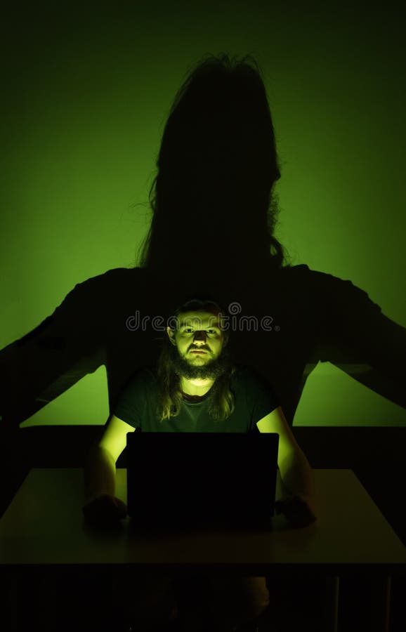Hacker on His Computer Trying To Enter a Private Porfile Stock Photo ...