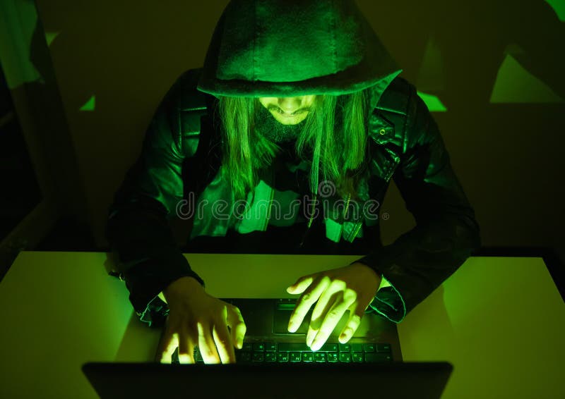 Hacker on His Computer Trying To Enter a Private Porfile Stock Photo ...