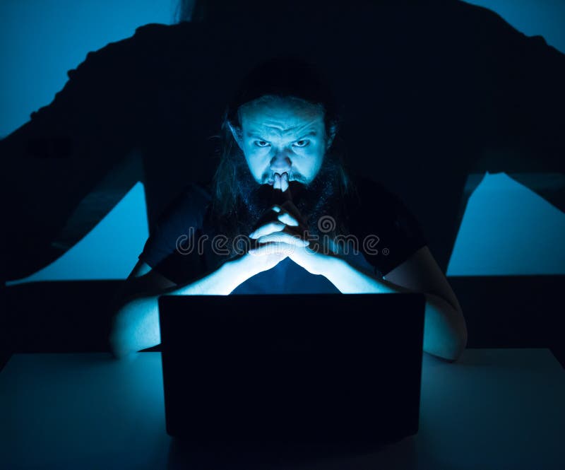 Hacker on His Computer Trying To Enter a Private Porfile Stock Photo ...