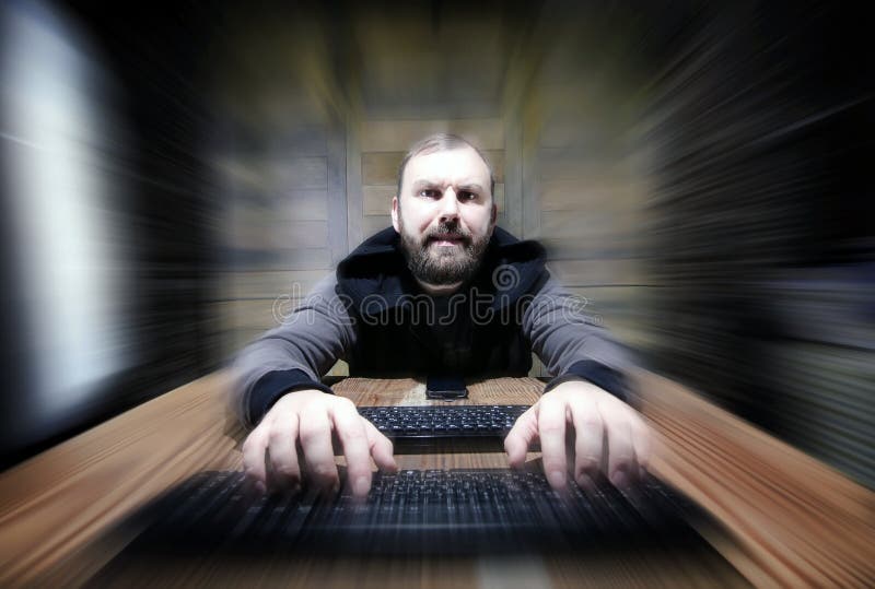 The Hacker in the Hood Sits and Works Stock Photo - Image of dark ...