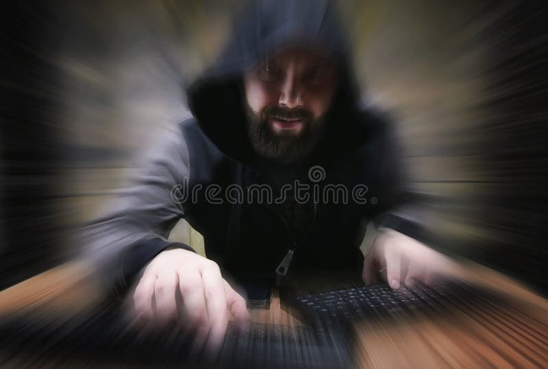 The Hacker in the Hood Sits and Works Stock Photo - Image of identity ...