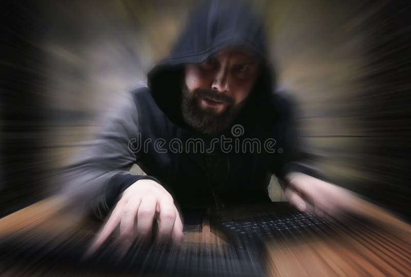 The Hacker in the Hood Sits and Works Stock Photo - Image of crime ...