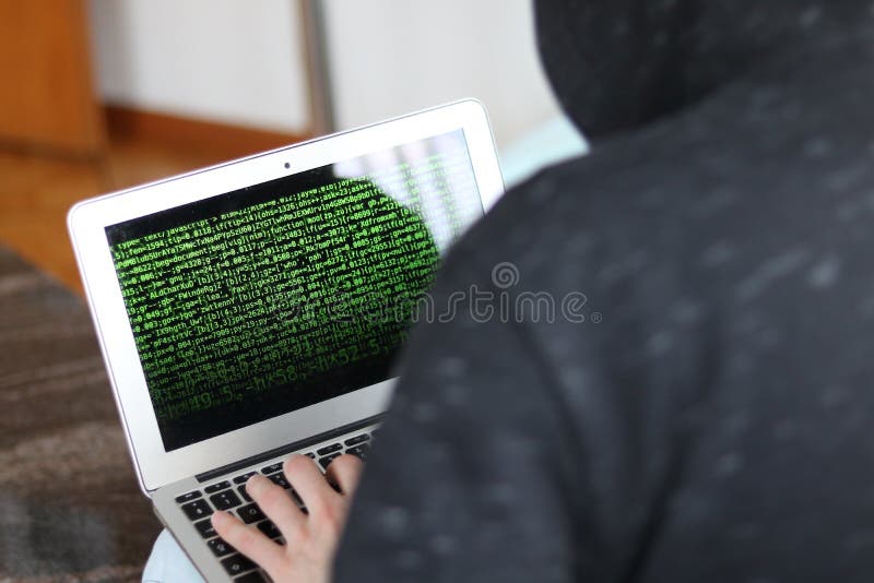 Hacker with Hood Typing on Computer Laptop Stock Image - Image of ...