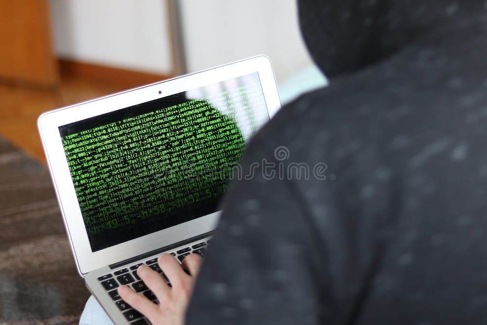 Hacker with Hood Typing on Computer Laptop Stock Image - Image of ...