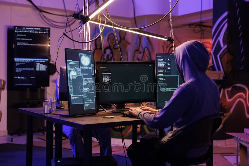 Hacker in Hood Using Spyware Stock Photo - Image of place, information ...