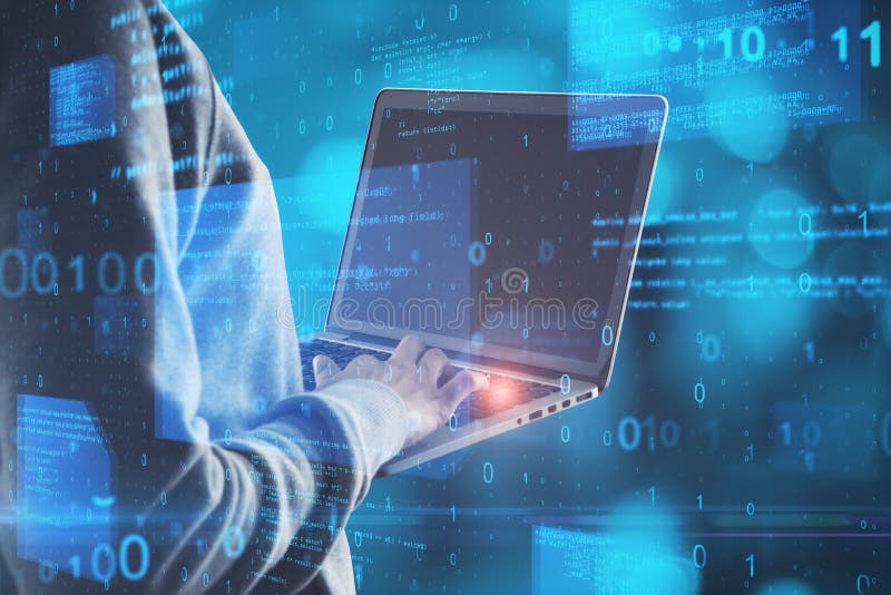 Hacker In Hoodie Using Notebook With Abstract Glowing Blue Coding