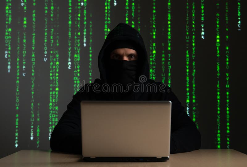 Computer Hacker With Credit Card Stealing Data From A Laptop Concept For Network Security 0606