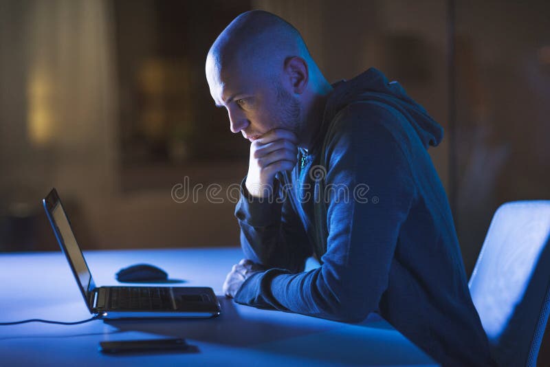 Hacker with Laptop Computer in Dark Room Stock Photo - Image of coding ...
