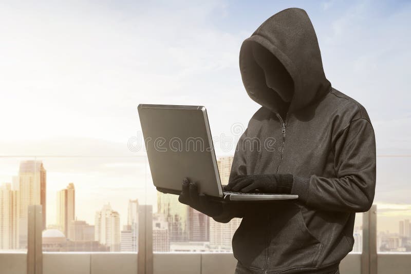 Hacker Man with Anonymous Mask Using Laptop To Hacking Stock Photo ...