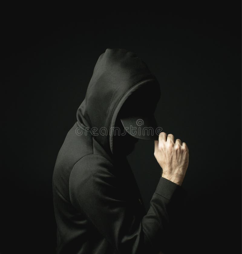 Hacker Man in Black Hat and Hoodie in the Dark Alone Stock Photo ...