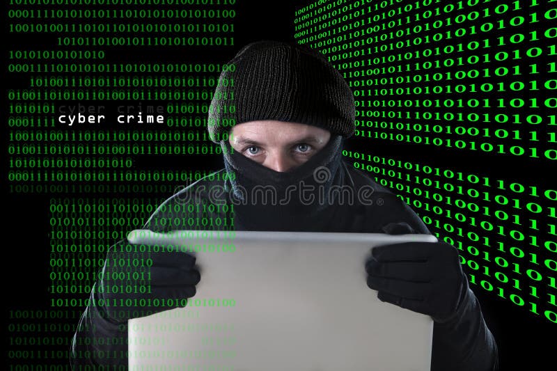 Hacker Man in Black Hood and Mask with Computer Laptop Hacking System ...