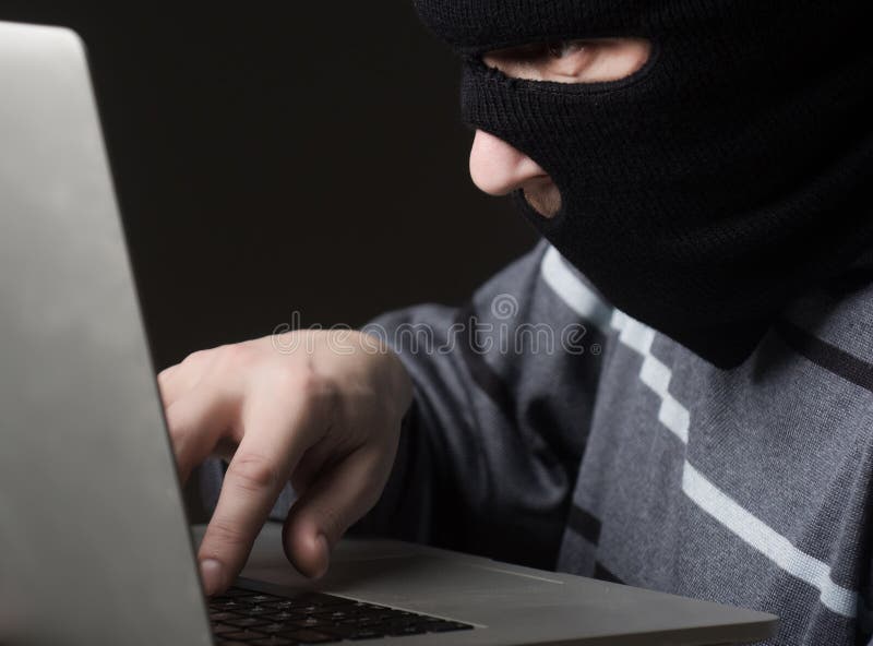 Hacker in a mask stock image. Image of burglar, caucasian - 67444453