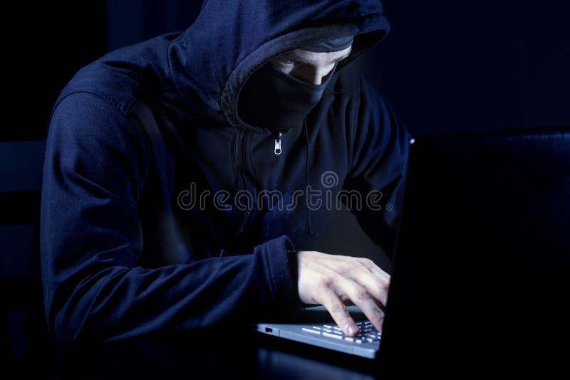 Hacker with Mask Using Laptop Computer Stock Photo - Image of data ...