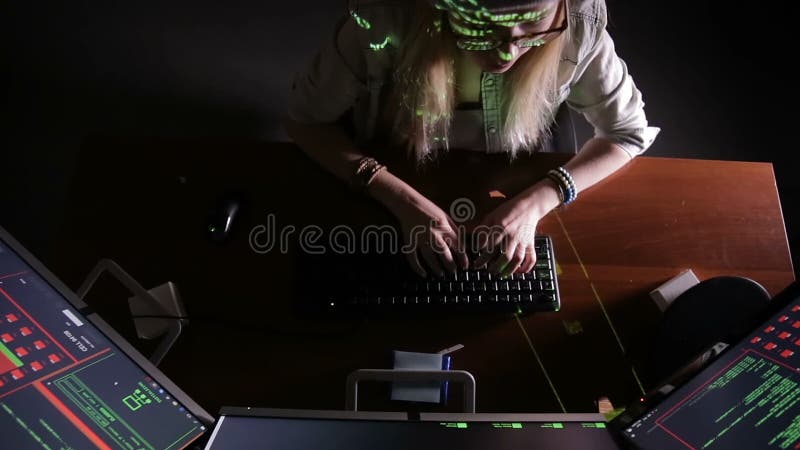 Hacker, Programmer Working with Data Code in a Dark Room. Hackers Desk ...