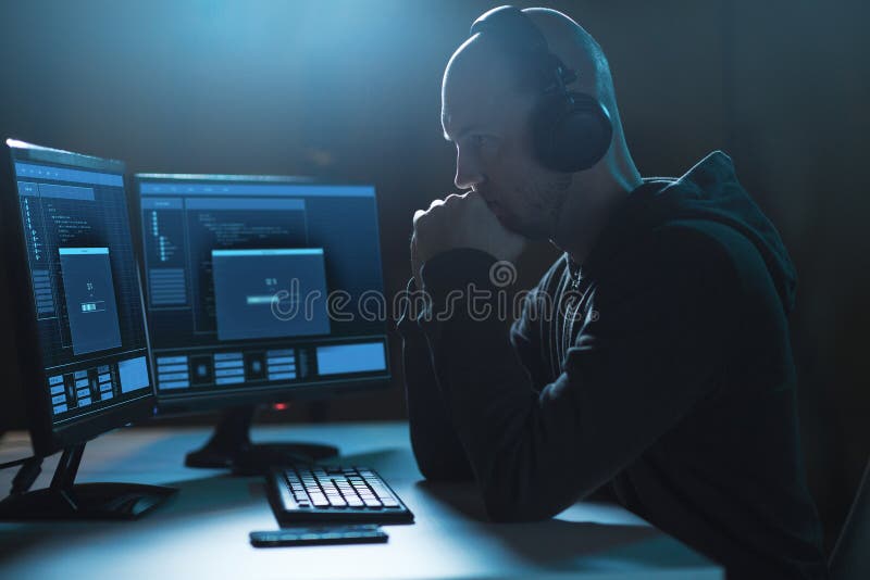 Hacker with Progress Bar on Computers in Dark Room Stock Image - Image ...