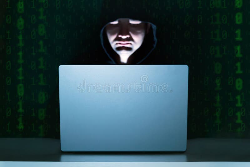 Hacker Sitting in Front of the Laptop at Night, Low Light with Zero and ...
