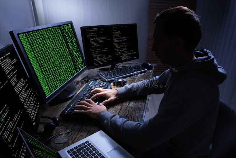 Hacker Stealing Information from Multiple Computers Stock Image - Image ... Hacker Stealing Information from Multiple Computers Stock Image - Image ...
