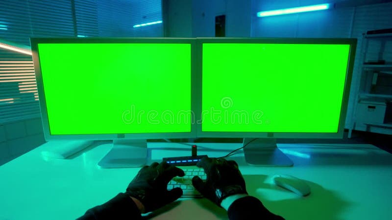 Hacker Stretching Hands in Black Gloves and Typing on a Computer ...