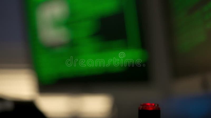 Hacker is Typing on a Computer Keyboard. a Green Line of Program Codes ...