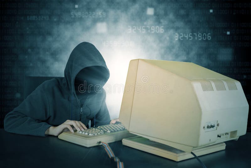 Hacker typing on a laptop stock photo. Image of criminal - 30511014