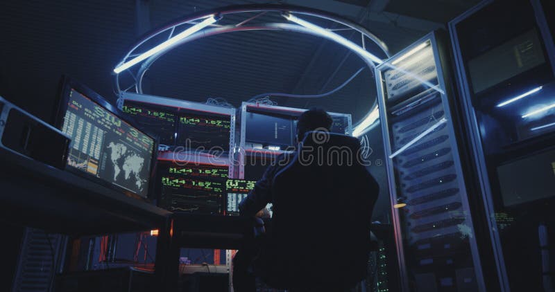 Hacker Using Computer with Multiple Monitors Stock Image - Image of ...