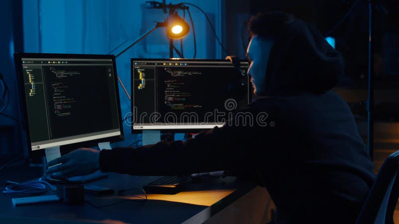 Hacker Using Computers for Cyber Attack at Night Stock Footage - Video ...