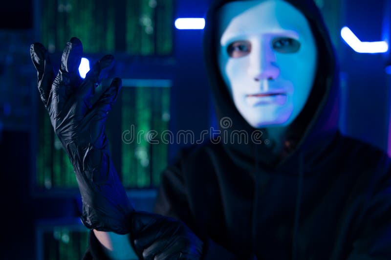 Hacker Is Using Laptop Computer To Steal Data In The Night Stock Image