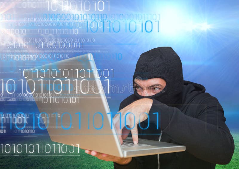 Hacker Using a Laptop in Front of Grass Field Stock Photo - Image of ...