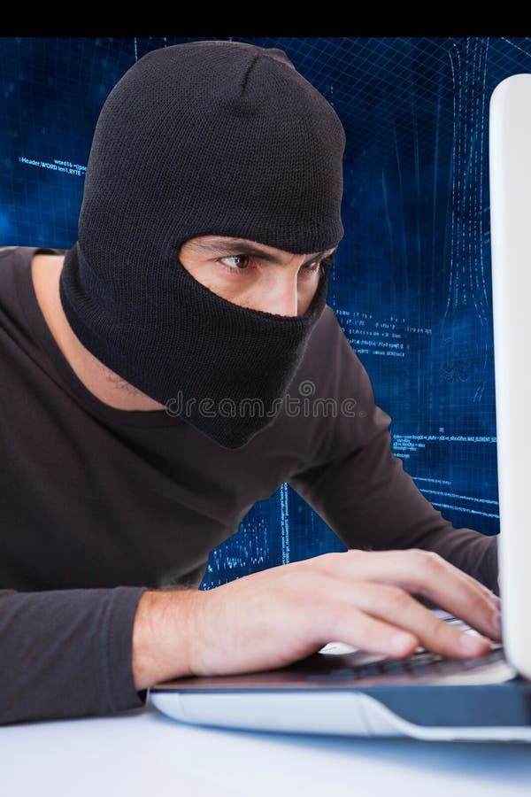Hacker using laptop stock photo. Image of hacking, frowning - 67711188