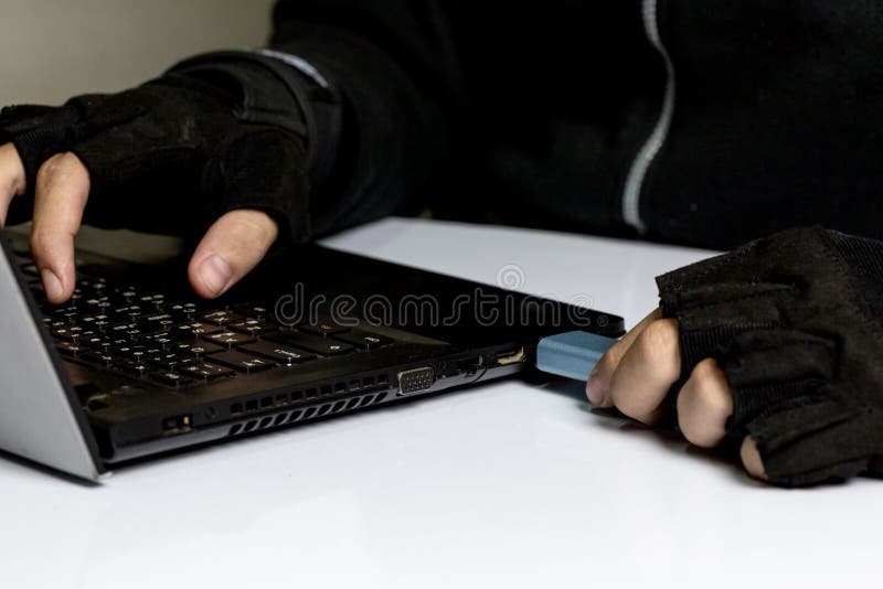 Hacker Using USB Flash Drive for Theft the Information Stock Photo ...