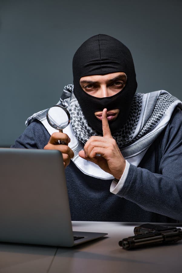 The Hacker Wearing Balaclava Mask Hacking Computer Stock Photo - Image ...