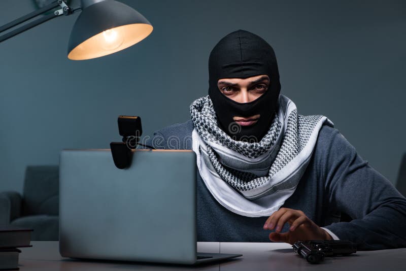 The Hacker Wearing Balaclava Mask Hacking Computer Stock Photo - Image ...