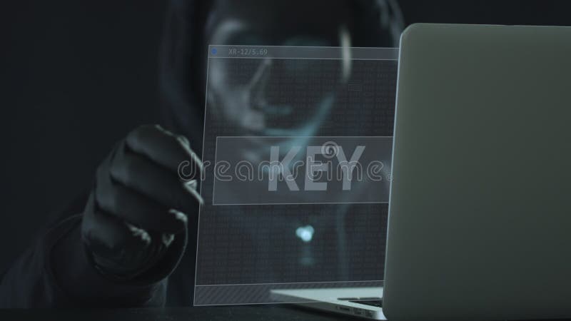 Hacker Wearing Black Mask Pulls KEY Tab from a Laptop Stock ...