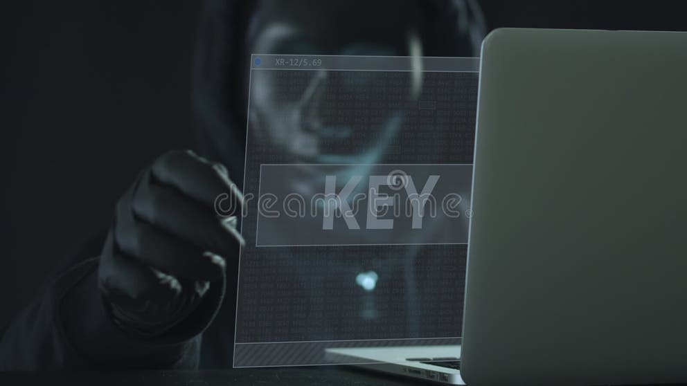 Hacker Wearing Black Mask Pulls KEY Tab from a Laptop Stock ...