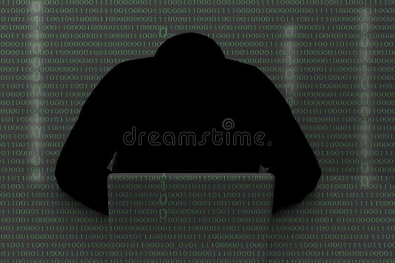 Hacker Wearing a Hooded Top Using Laptop Computer in the Dark. T Stock ...