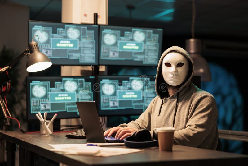 Hacker Wearing Mask and Hood To Hack Computer Stock Image - Image of ... Hacker Wearing Mask and Hood To Hack Computer Stock Image - Image of ...