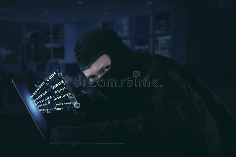 Hacker Wearing Mask Using Flash Light. Stock Image - Image of night ...