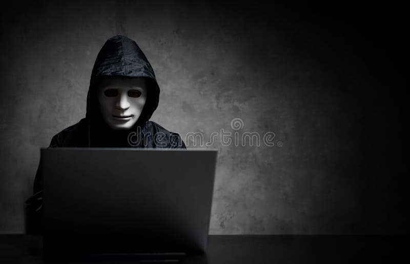 Hacker Wearing a White Mask in Front of His Computer. Hacker Hacks ...