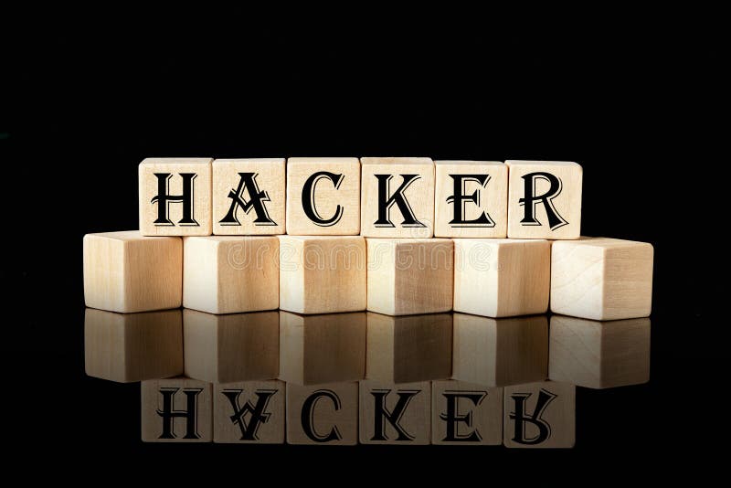 Hacker Word on Wooden Cubes on a Glossy Black Background Stock Image ...