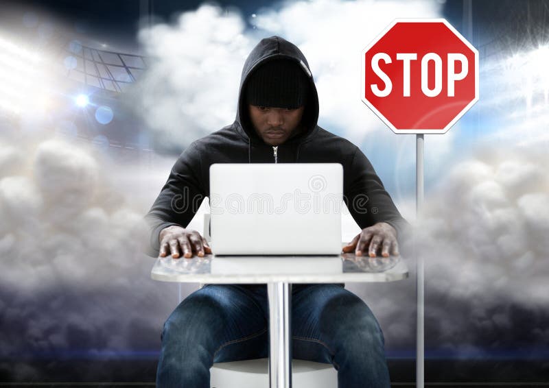 Hacker Working On Laptop In Front Of Stop Board Stock Photo - Image of ...