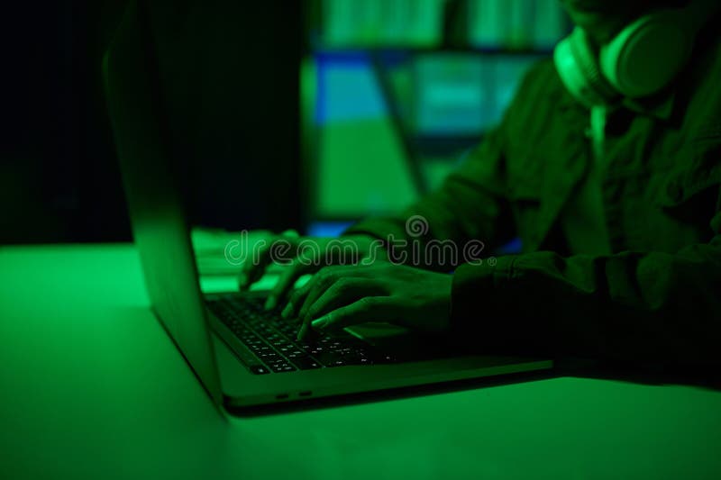 Hacker Working on Laptop stock photo. Image of dark - 288274842