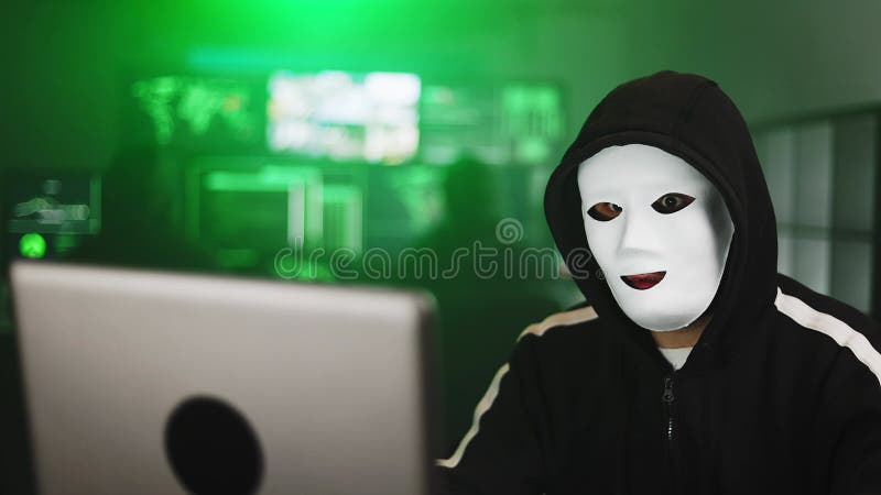 Hacker Working on Laptop Preparing a Cyber Attack in Dark Room Stock ...