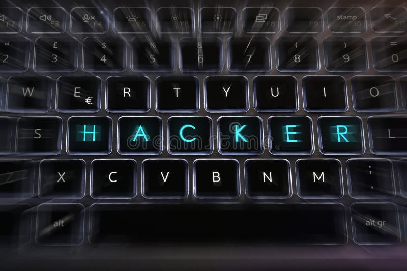 Hacker Written on the Keys of a Laptop Backlit Keyboard. Internet Data ...