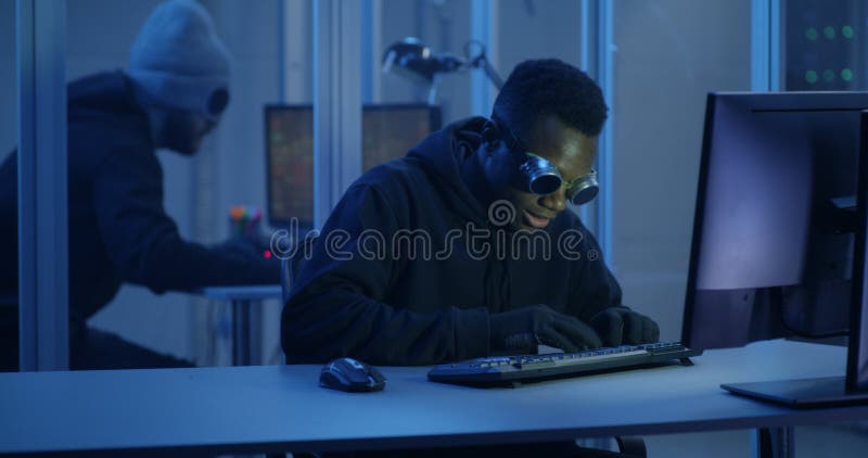 Hackers Breaking into a Data Center Stock Image - Image of coding ...