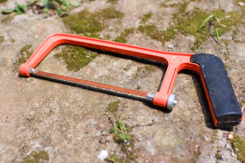 The Hacksaw Hand Tool is Placed on the Ground Stock Image - Image of ...