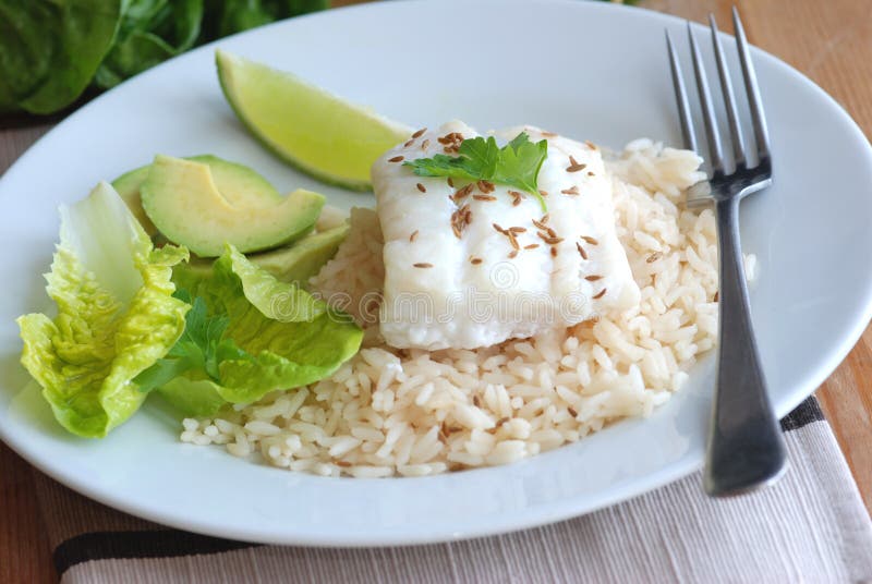 Haddock with rice stock image. Image of vegetable, fillet - 15860767